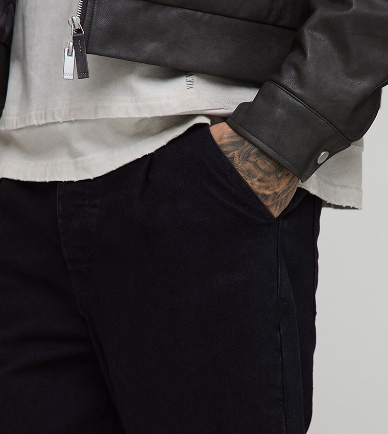 Buy BoohooMAN Tall Relaxed Fit Flared Jeans In Black | 6thStreet Qatar