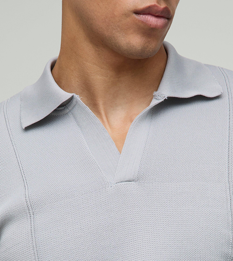 Buy BoohooMAN Regular Fit Button Neck Pin Tuck Knitted Polo T Shirt In ...