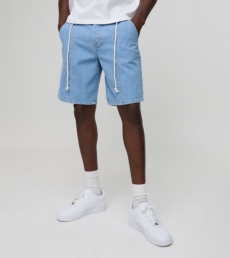 Buy BoohooMAN Relaxed Fit Pintuck Light Washed Belted Denim Shorts In ...