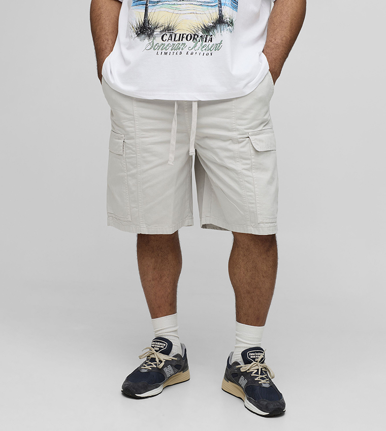Buy BoohooMAN Seam Detail Extended Drawcord Relaxed Fit Cargo Shorts In ...