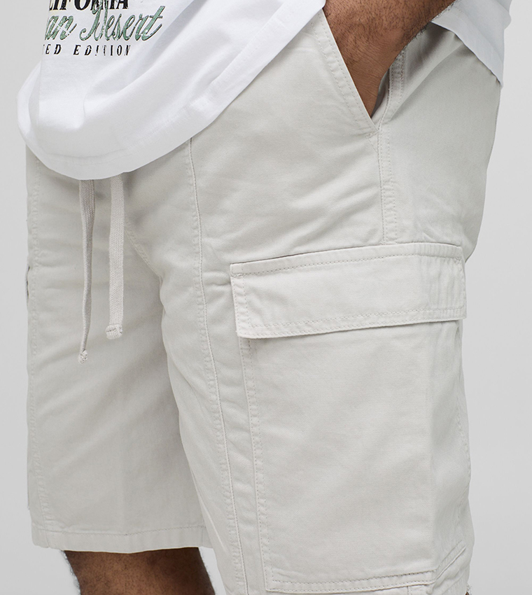 Buy BoohooMAN Seam Detail Extended Drawcord Relaxed Fit Cargo Shorts In ...