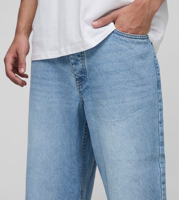 Buy BoohooMAN Ripped Let Down Hem Wide Leg Jeans In Blue | 6thStreet ...