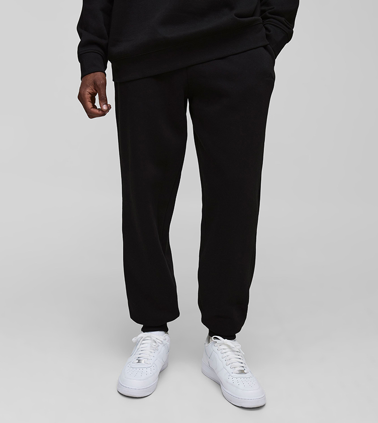 Buy BoohooMAN Tall Solid BM Signature Regular Fit Joggers In Black ...