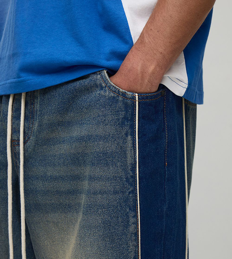Buy BoohooMAN Side Panel Piping Super Baggy Fit Jeans In Blue ...