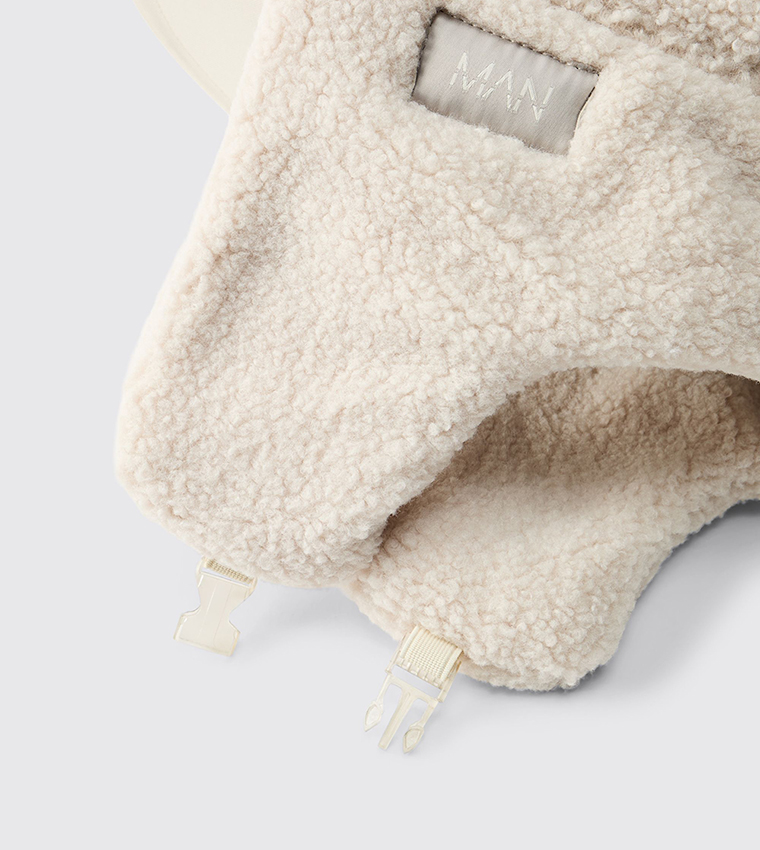 Buy BoohooMAN Woven Tab Borg Trapper Hat In Beige | 6thStreet UAE