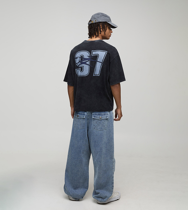 Buy BoohooMAN Sport Moto Graphic Printed Oversized T Shirt In Black ...
