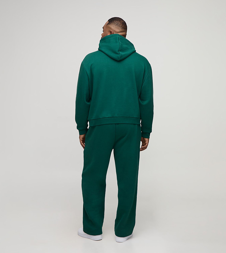 Buy BoohooMAN Ofcl Print Hoodie & Baggy Fit Sweatpant Tracksuit In ...