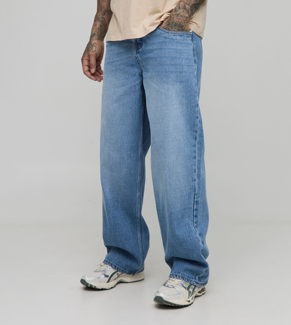Buy BoohooMAN Tall Drop Pocket Detail Relaxed Fit Jeans In Blue ...