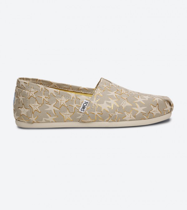Buy Toms Classic Slip Ons Beige 10009729 In Tan | 6thStreet Qatar