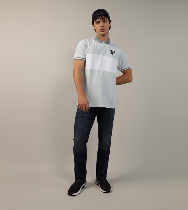 Buy American Eagle Color Block Logo Flex Pique Polo T Shirt In Blue ...