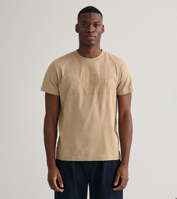 Buy GANT Tonal Archive Shield Logo Embossed T Shirt In Brown ...