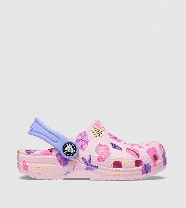 Buy Crocs Classic Pool Party Clogs In Pink | 6thStreet Qatar