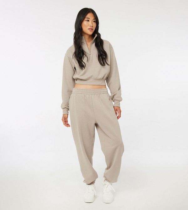 Buy Ardene Elastic Waist Oversized Joggers In Beige | 6thStreet Qatar