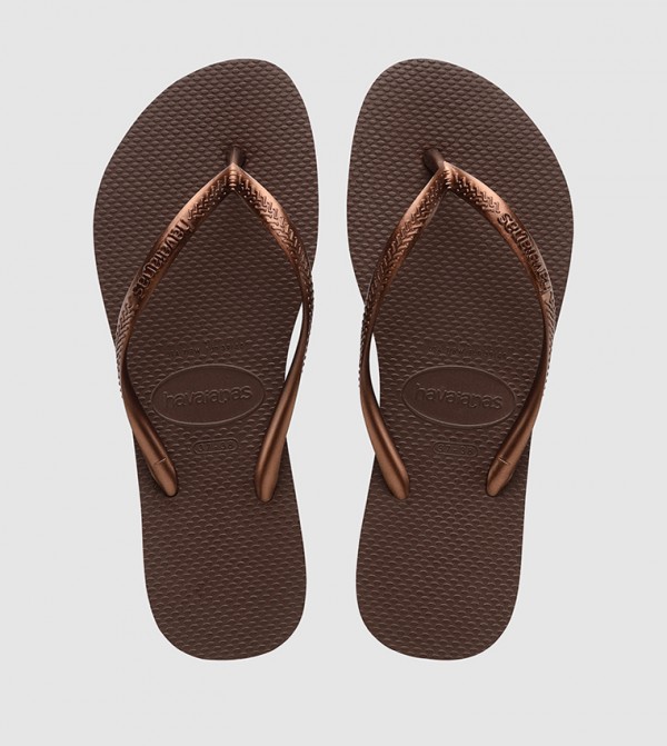 Buy Havaianas Slim Flip Flops In Brown | 6thStreet UAE