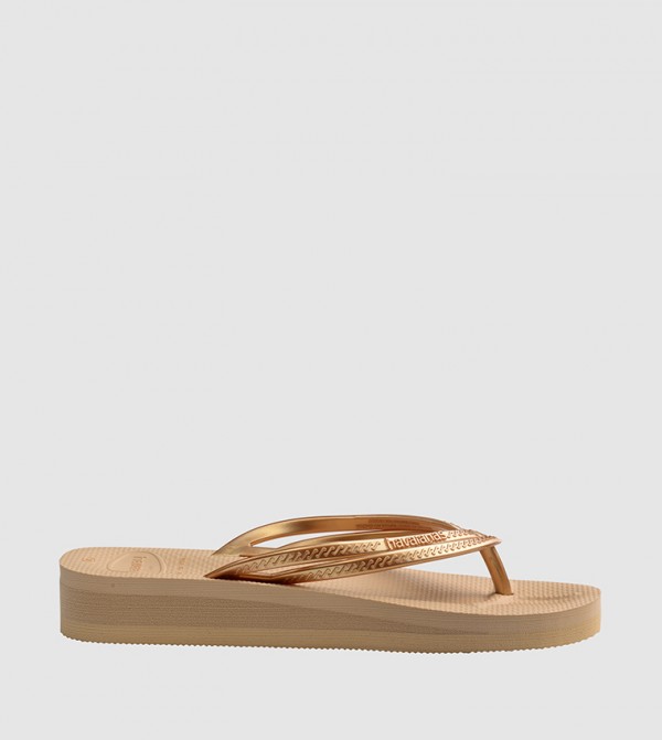 Buy Havaianas Wedges Flip Flops In Gold | 6thStreet UAE
