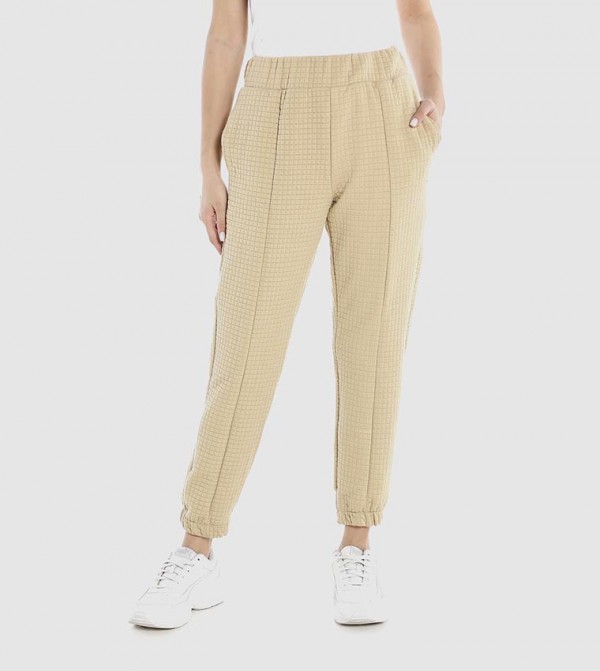 Buy R&B Solid Regular Fit Pants In Tan | 6thStreet UAE
