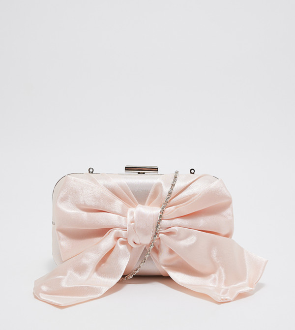 Buy Quazi @ CCC Bow Detail Clutch With Sling In Pink | 6thstreet Qatar