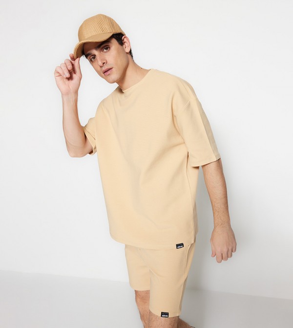Buy Trendyol Limited Edition Label Detail Oversized T Shirt In Beige ...
