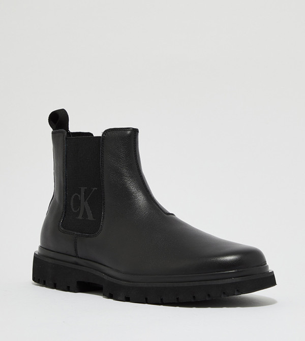 Buy Calvin Klein Lug Mid Chelsea Boot In Black | 6thstreet Kuwait
