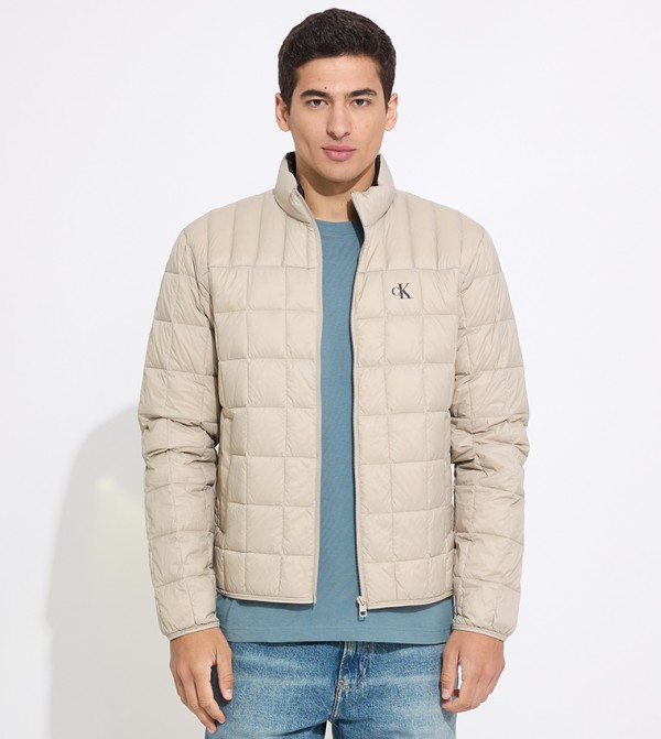 Buy Calvin Klein Jeans Quilted Ultra Light Logo Detail Jacket In Beige ...