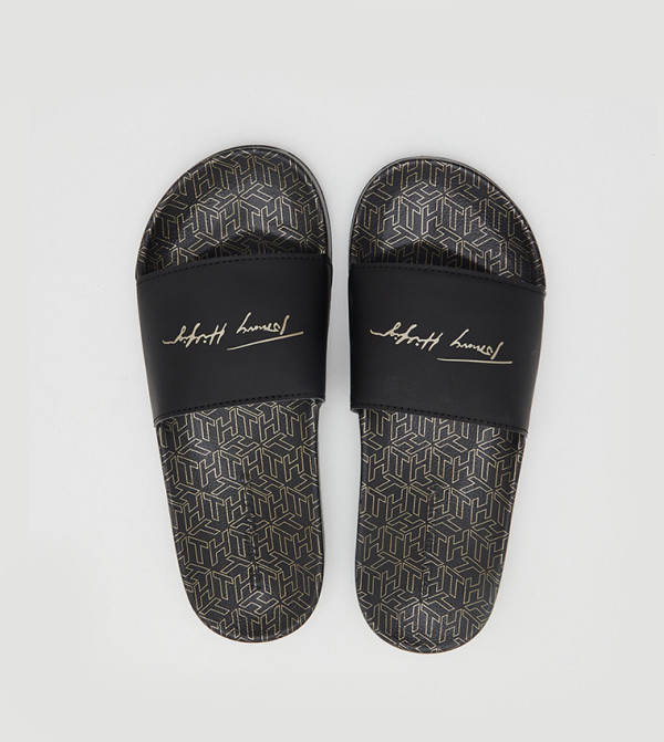 Buy Tommy Hilfiger Signature Logo Pool Slides In Black | 6thStreet ...