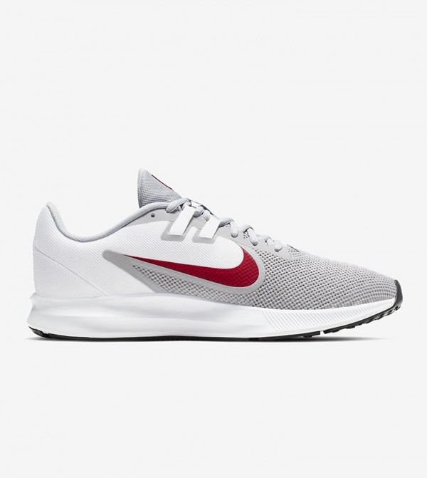 Buy Nike Logo Print Lace Up Sneakers Grey In Grey | 6thStreet UAE