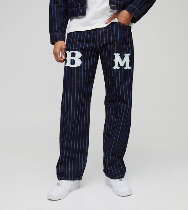 Buy BoohooMAN Pinstripe Appliqued Relaxed Fit Jeans In Dark Blue ...