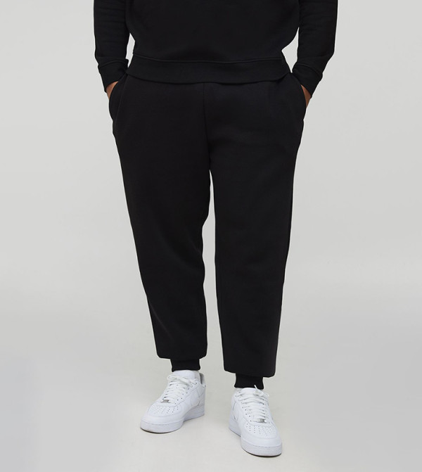 Buy BoohooMAN Plus & Tall Solid BM Signature Regular Fit Joggers In ...
