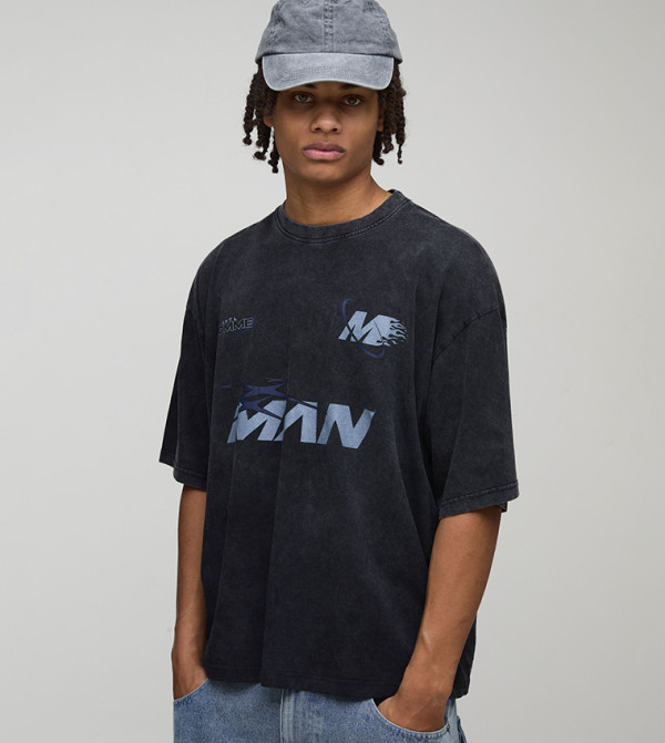 Buy BoohooMAN Sport Moto Graphic Printed Oversized T Shirt In Black ...