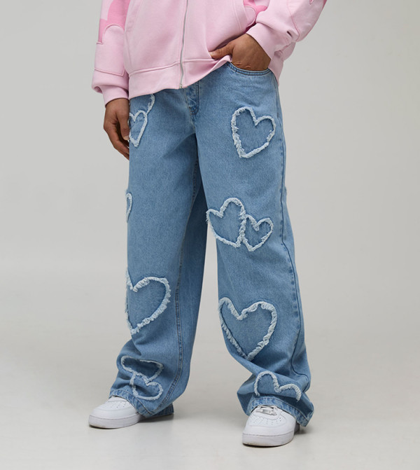 Buy BoohooMAN Heart Appliqued Baggy Jeans In Light Blue | 6thstreet Kuwait