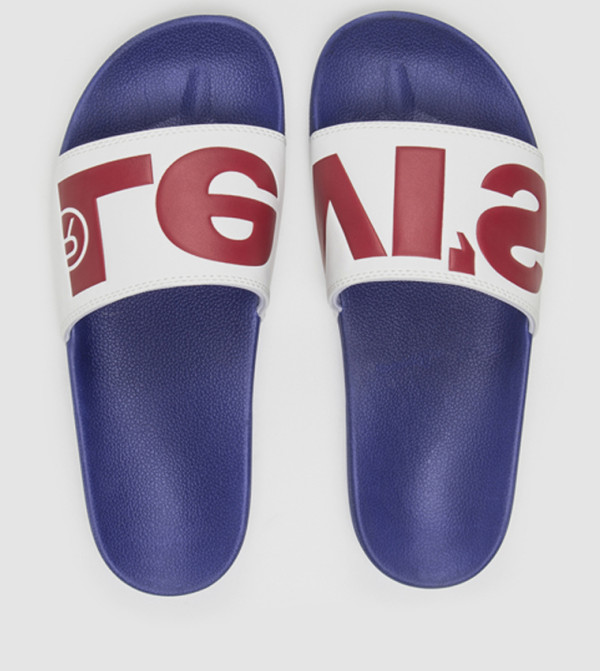 Buy Levi's JUNE Logo Print Slides In Blue | 6thStreet UAE