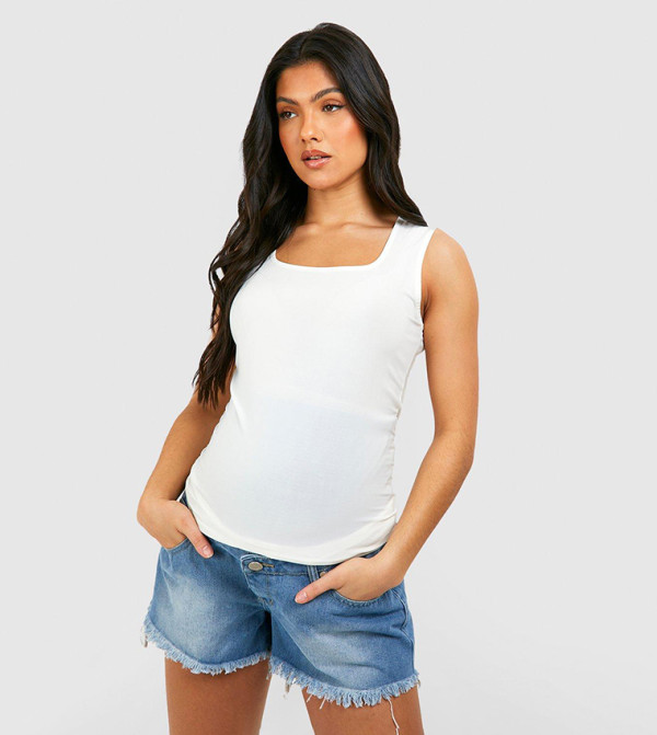 Buy Boohoo Over The Bump Frayed Hem Denim Shorts In Blue | 6thStreet UAE