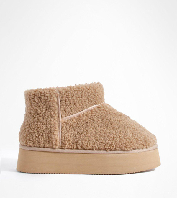 Buy Boohoo Borg Ultra Mini Platform Cosy Boots In Beige | 6thStreet UAE