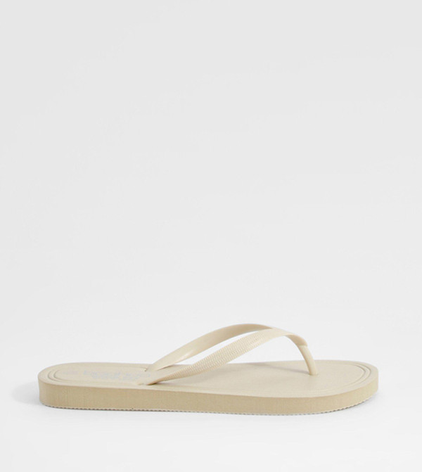 Buy Boohoo Outlet Wide Fit Round Toe Flip Flops In Nude | 6thStreet UAE