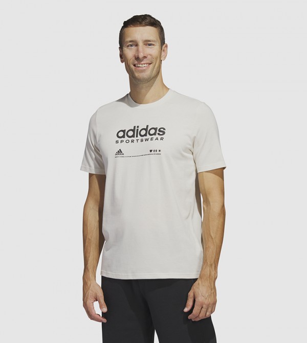 Buy Adidas Logo Detail Crew Neck Athleisure T Shirt In Ivory ...