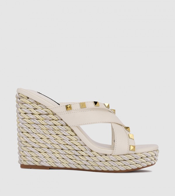 Buy Nine West Pyramid Studded Wedges In White | 6thStreet UAE