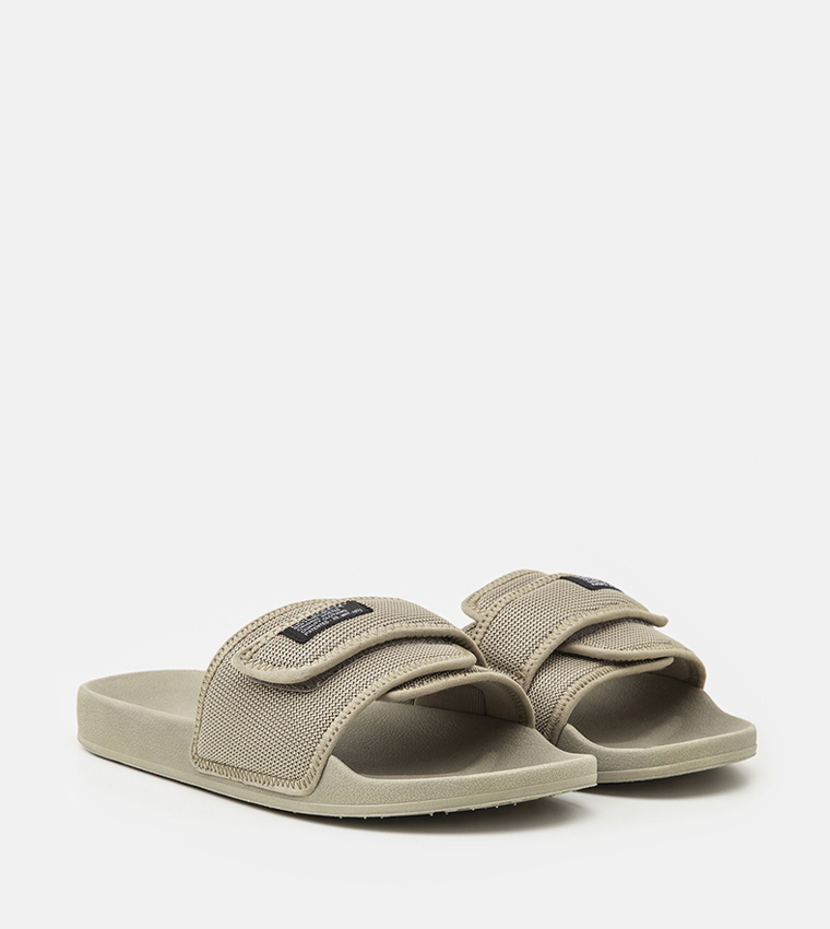 Buy Levi's June Binder Slides In Taupe | 6thStreet UAE