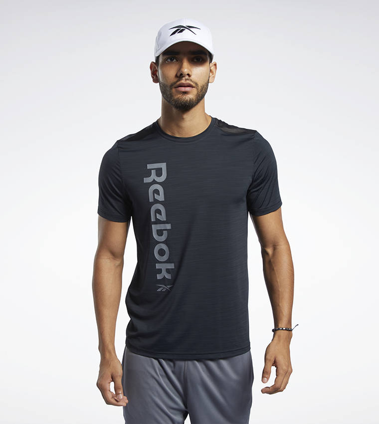 Buy Reebok Wor Ac Graphic Ss Q1 T Shirts Black In Black | 6thStreet Bahrain