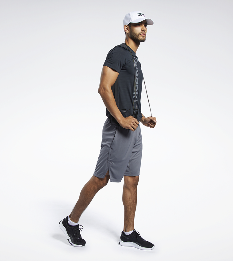 Buy Reebok Wor Ac Graphic Ss Q1 T Shirts Black In Black | 6thStreet Bahrain