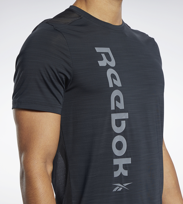 Buy Reebok Wor Ac Graphic Ss Q1 T Shirts Black In Black | 6thStreet Bahrain