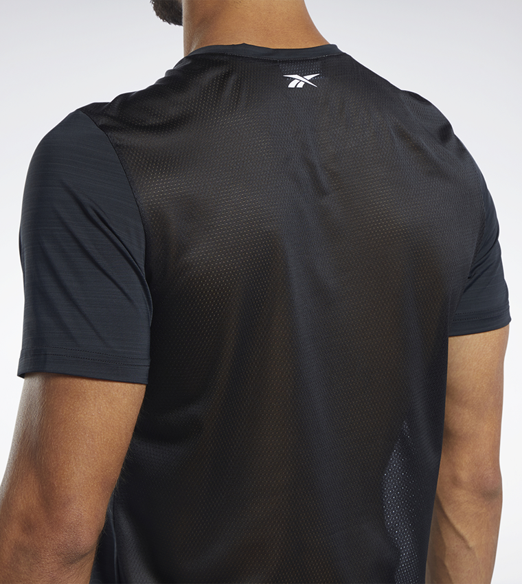 Buy Reebok Wor Ac Graphic Ss Q1 T Shirts Black In Black | 6thStreet Bahrain
