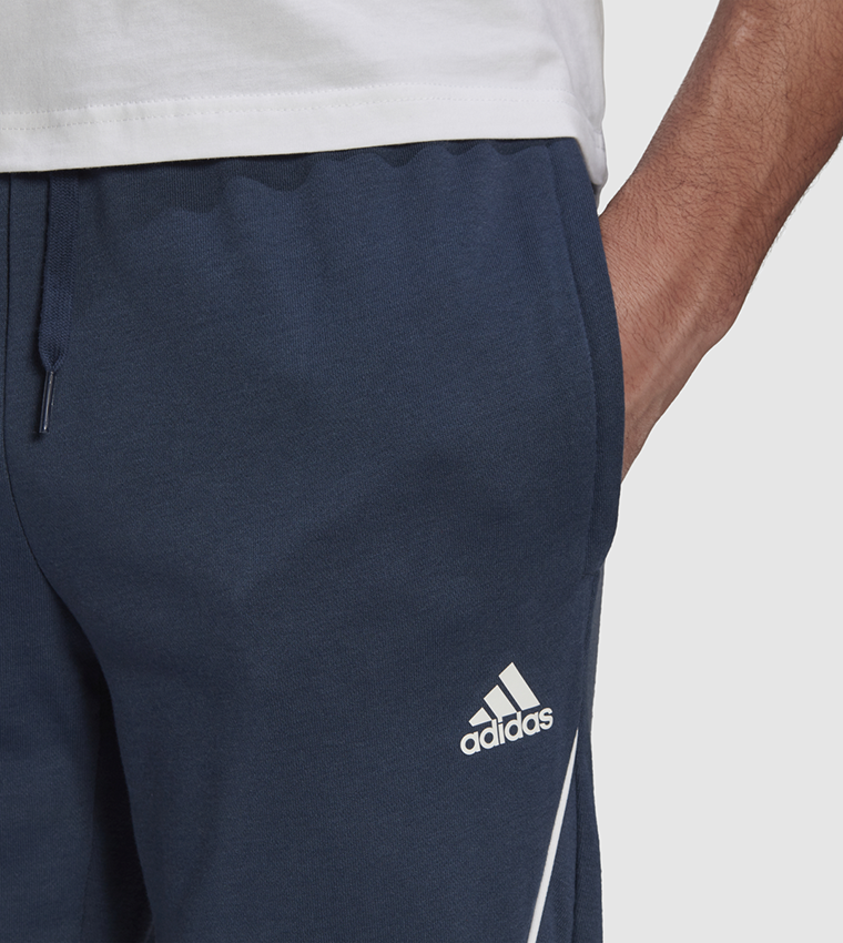 Buy Adidas Essentials Logo Pants In Blue | 6thstreet Qatar