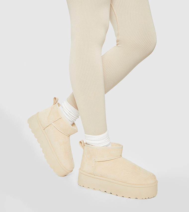 Buy Boohoo Ultra Mini Platform Cosy Boots In Beige | 6thStreet UAE