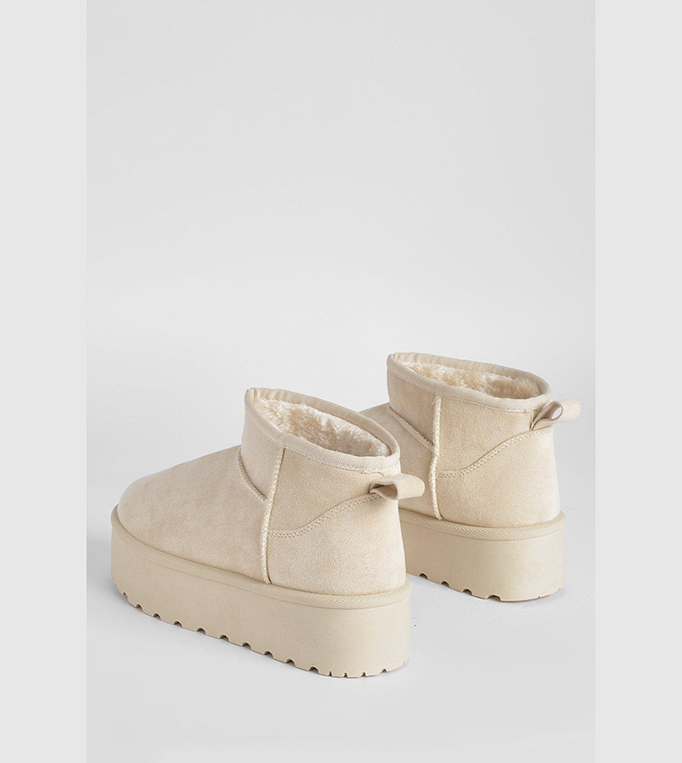 Buy Boohoo Ultra Mini Platform Cosy Boots In Beige | 6thStreet UAE