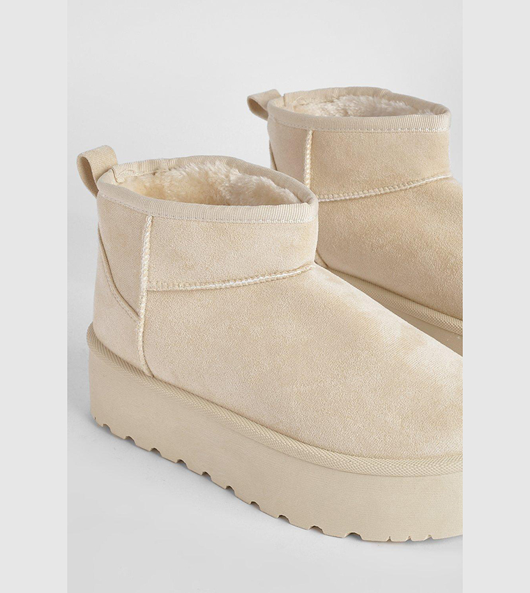 Buy Boohoo Ultra Mini Platform Cosy Boots In Beige | 6thStreet UAE