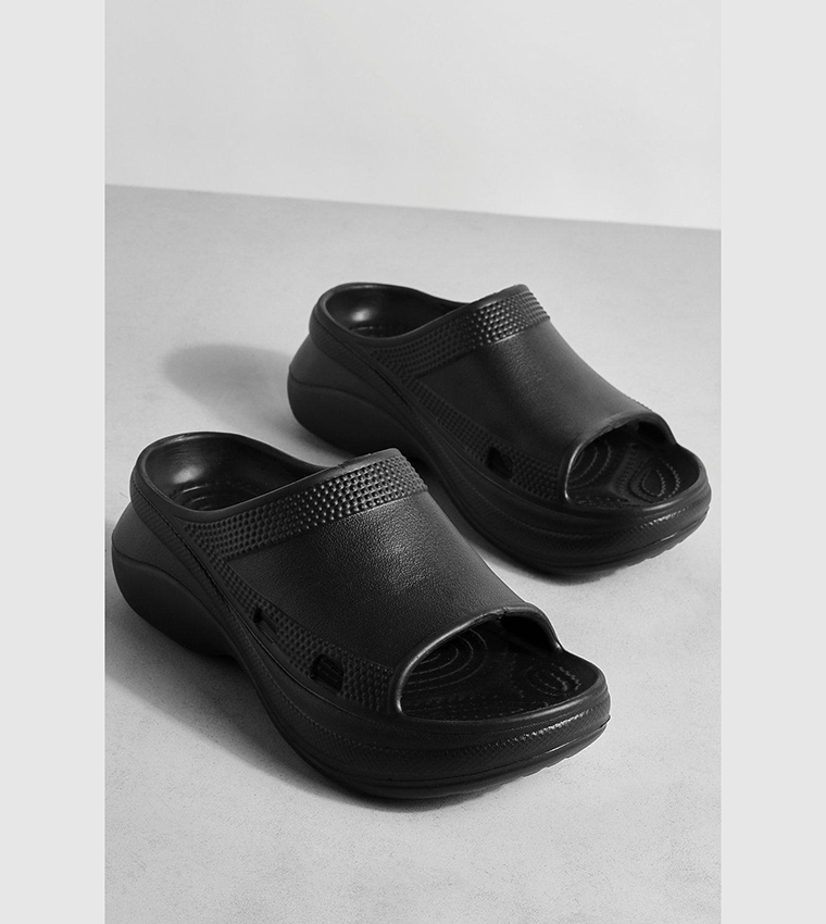 Buy Boohoo Chunky Wave Sole Platform Slides In Black | 6thStreet Oman