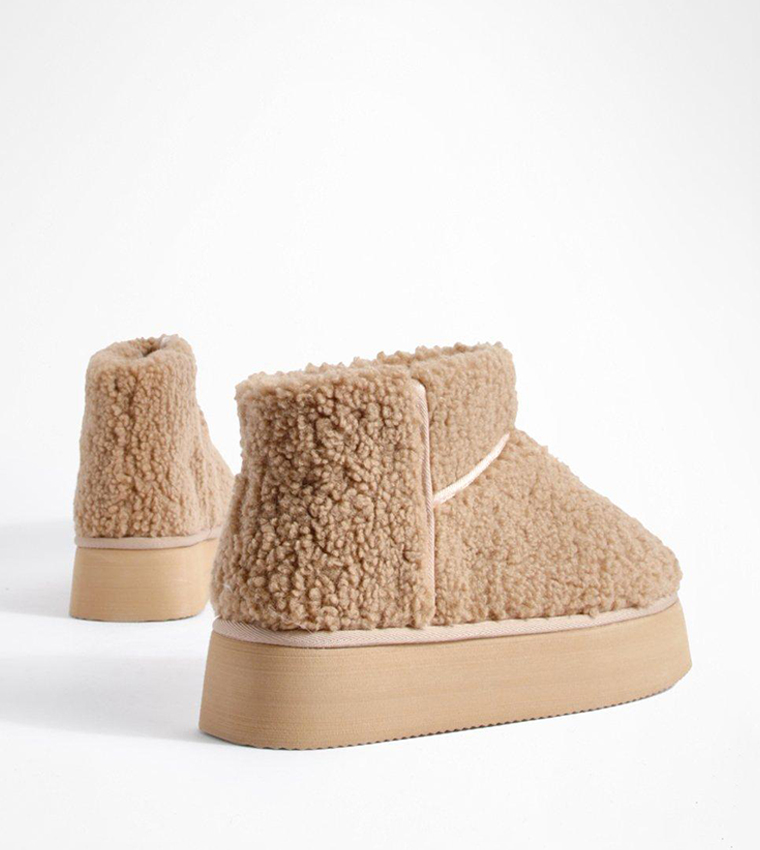 Buy Boohoo Borg Ultra Mini Platform Cosy Boots In Beige | 6thStreet UAE