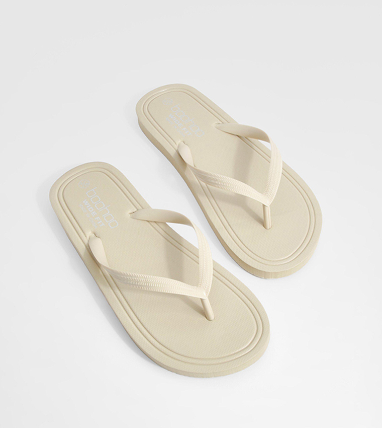 Buy Boohoo Outlet Wide Fit Round Toe Flip Flops In Nude | 6thStreet UAE