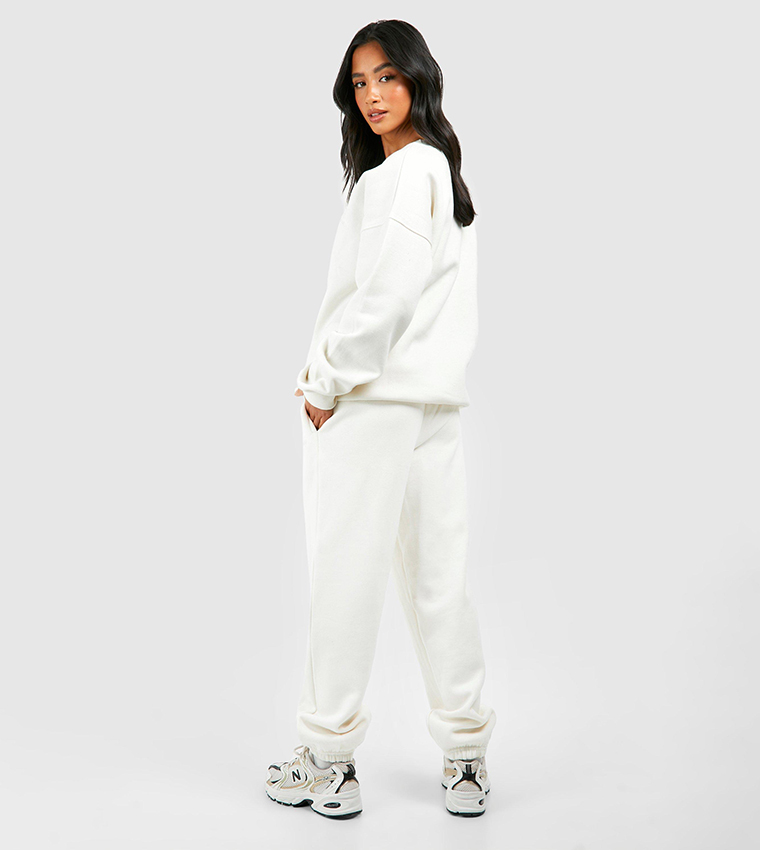 Buy Boohoo Petite Design Studio Tracksuit Set In Ecru | 6thStreet UAE