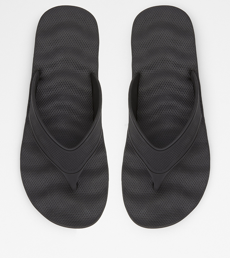 Buy Aldo Haciendo Textured Flip Flops In Black | 6thStreet Qatar